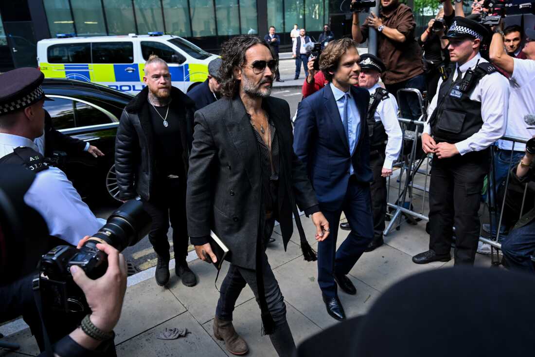 Russell Brand pleads not guilty to rape and assault charges in London